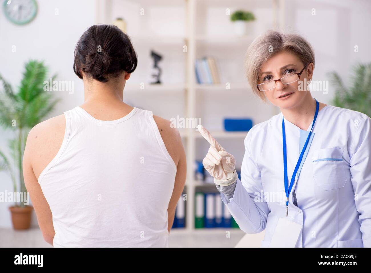 The young patient visiting doctor in hospital Stock Photo - Alamy
