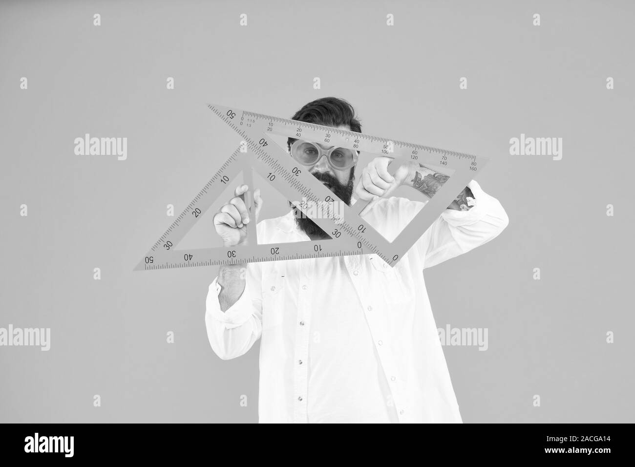 Student using measuring instrument. Engineering architecture faculty ...