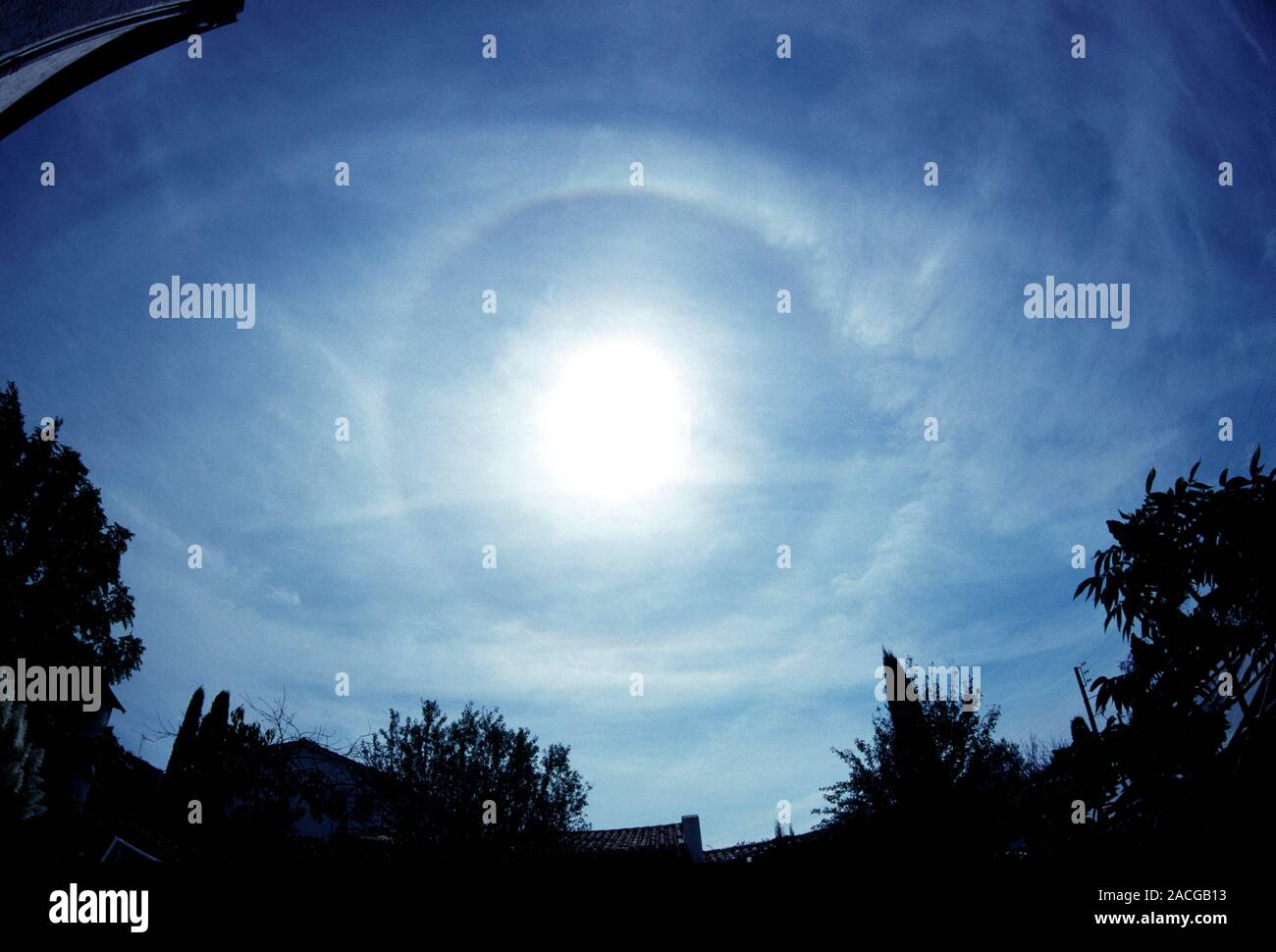 Solar halo. This atmospheric optical phenomenon is seen here around the ...