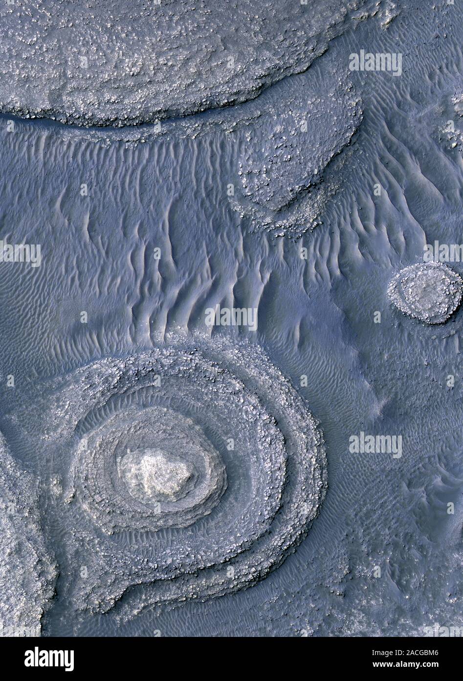 Exposed rock layers on Mars. Coloured satellite image of layered rocks ...