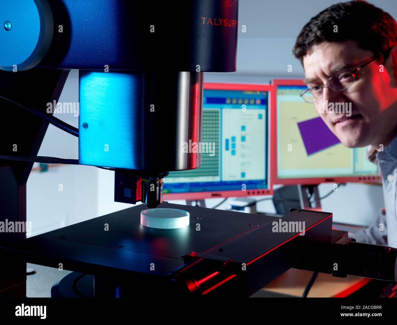 Optical coherence tomography. Scientist using an optical coherence ...