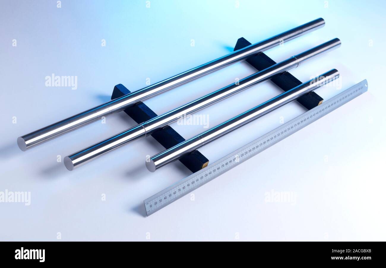Precision length measurement. Selection of different length metal bars ...
