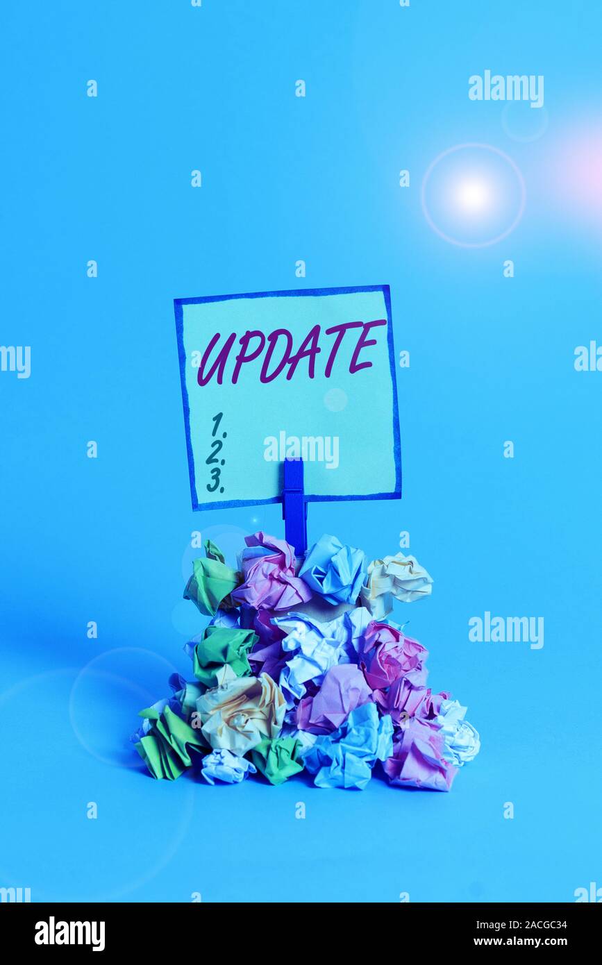 Conceptual hand writing showing UPDATE. Concept meaning make something ...