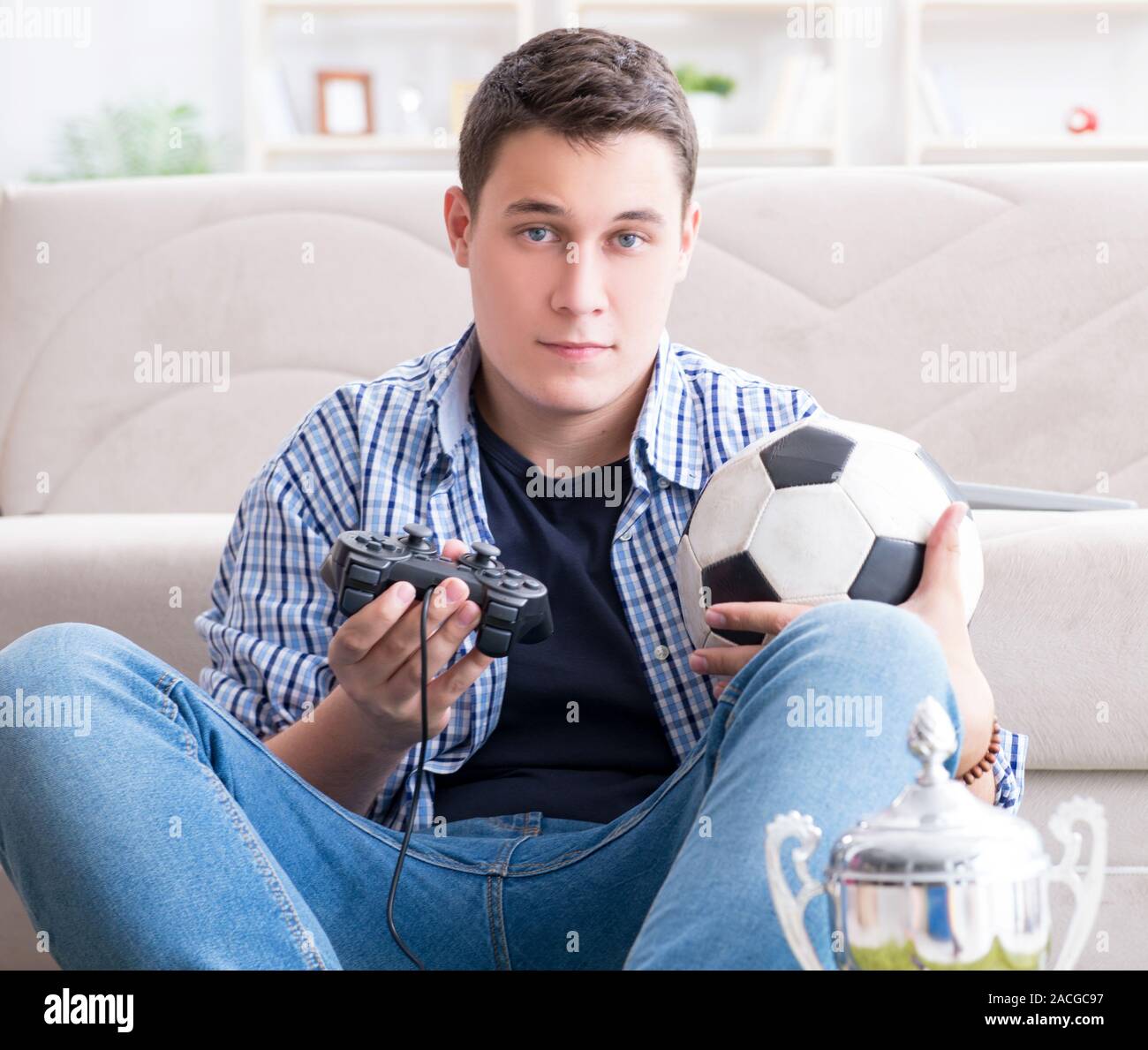 The young man playing computer games at home Stock Photo - Alamy