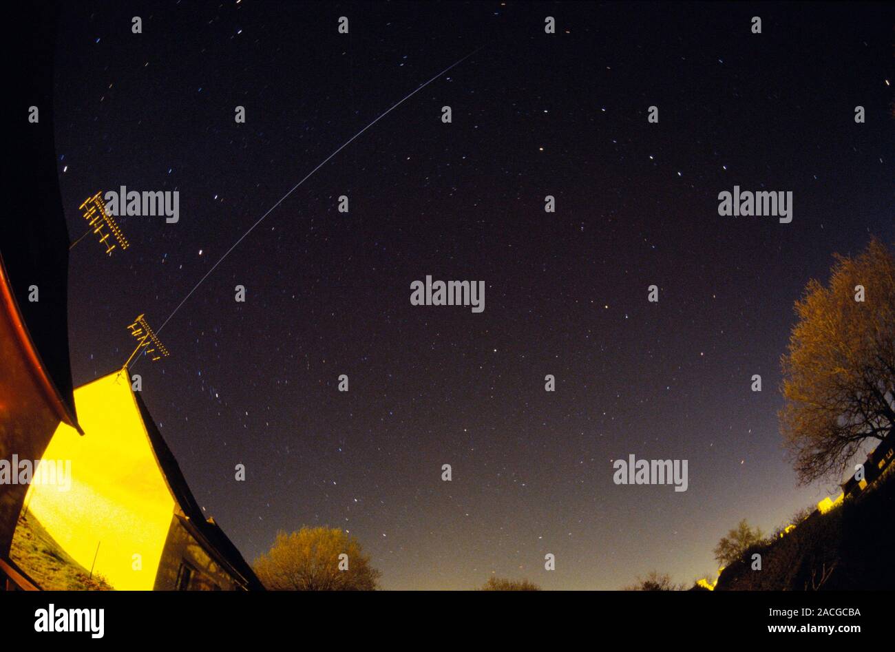 International Space Station. Time-exposure image, showing the trail of ...