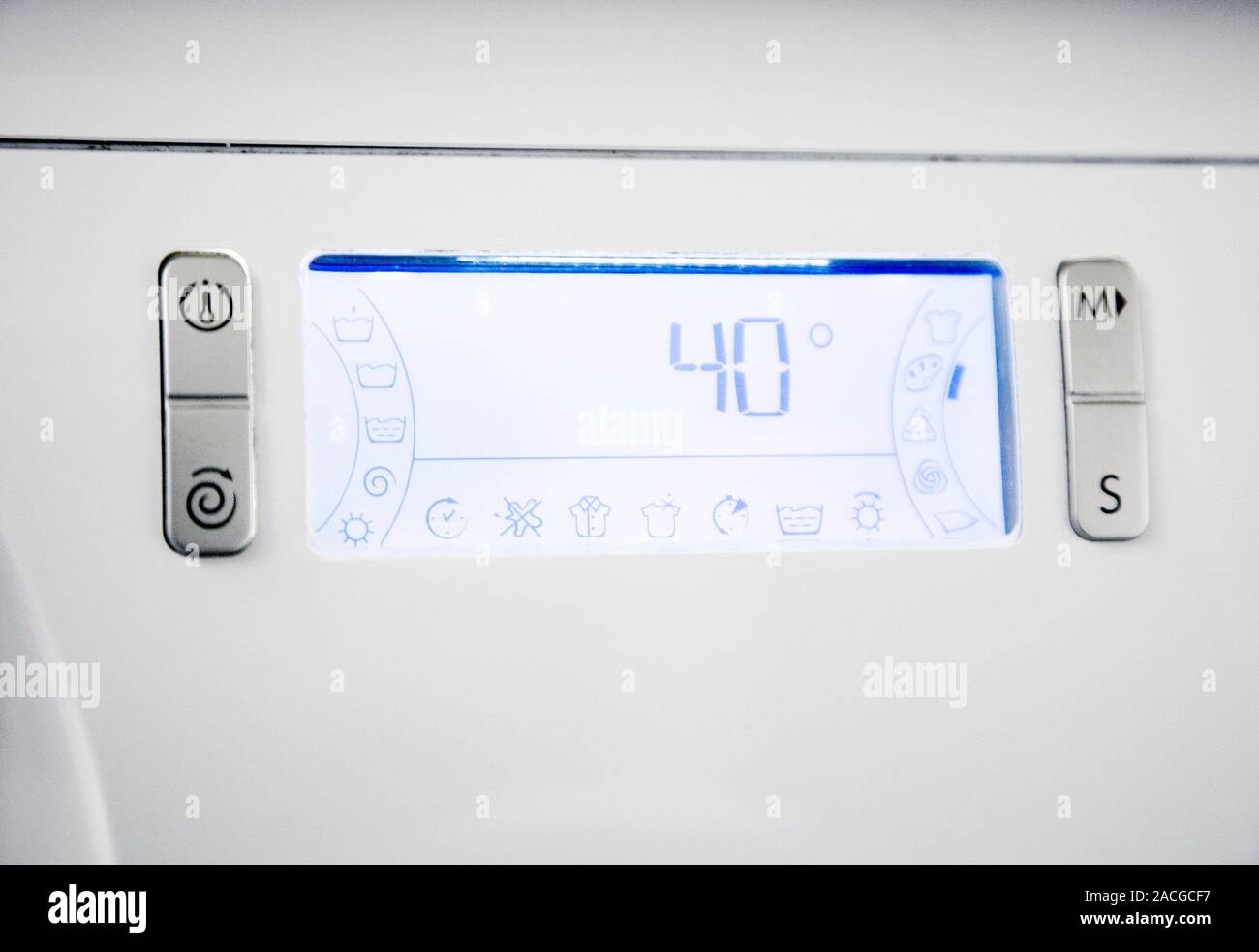 Washing machine control panel. Close-up of a liquid crystal display ...