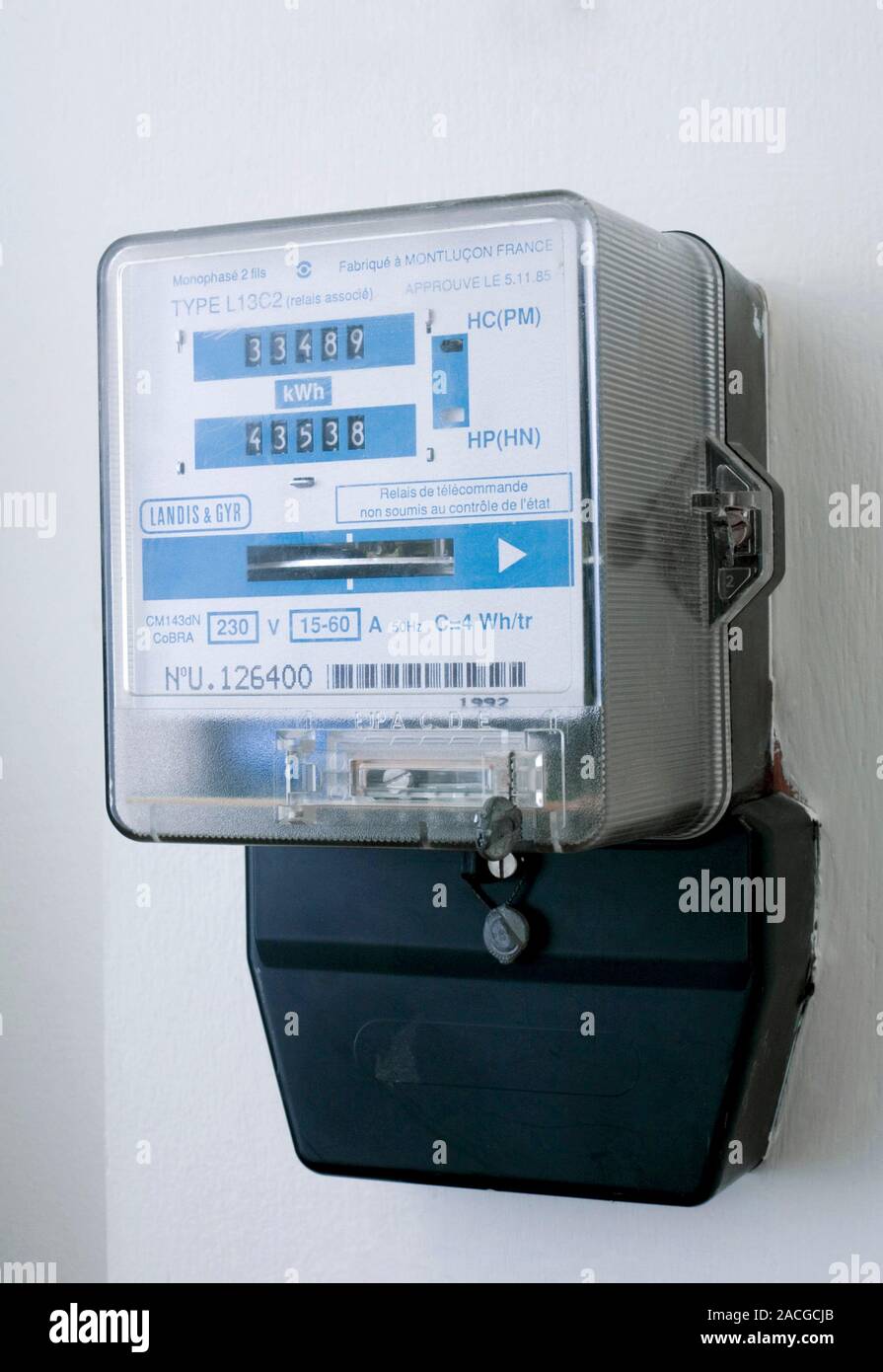 Domestic electricity meter in a person's home. Photographed in France ...
