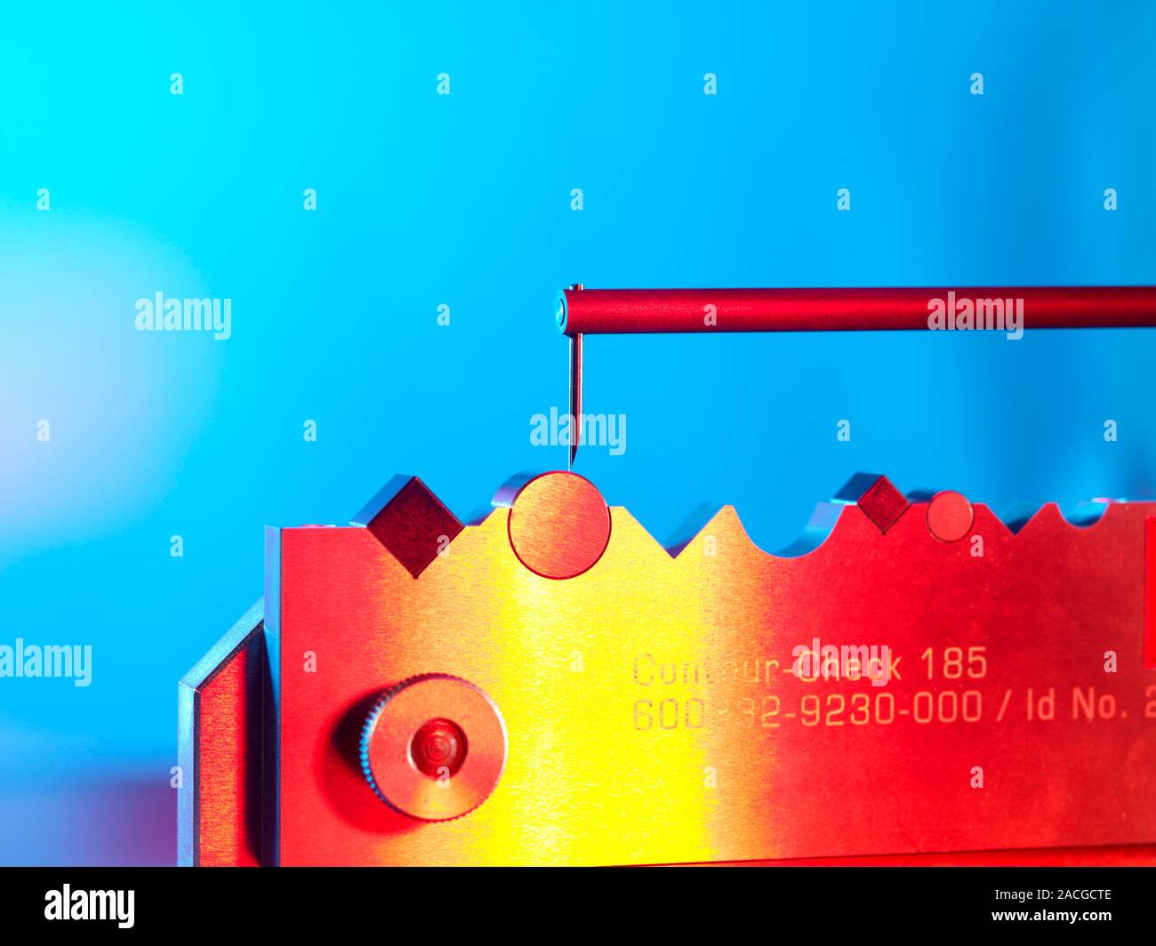 Contact stylus measurement device being used to measure a standard ...