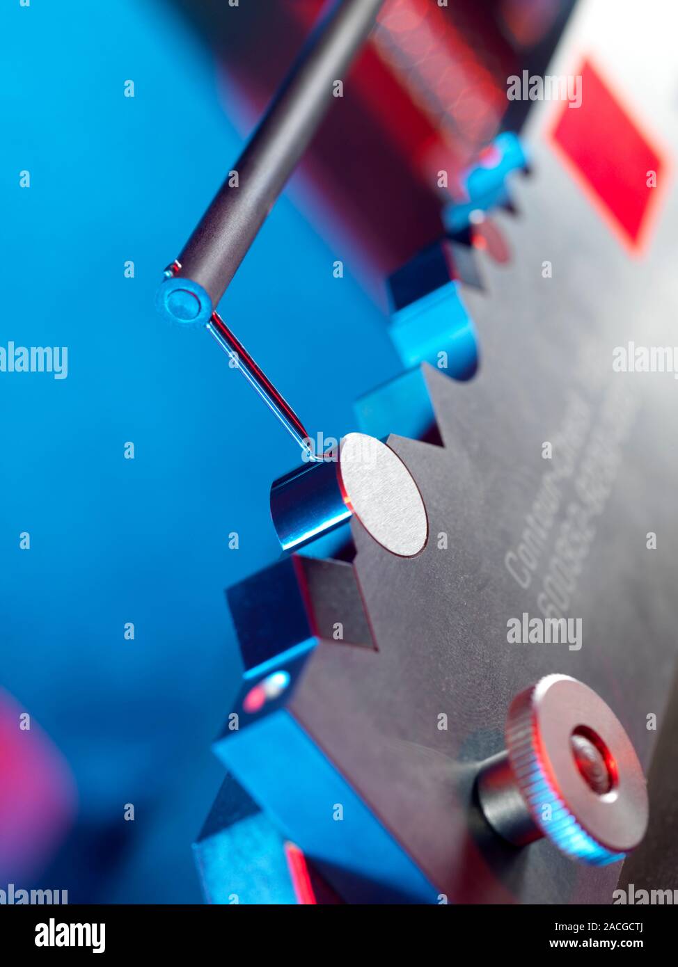 Contact stylus measurement device being used to measure a standard ...