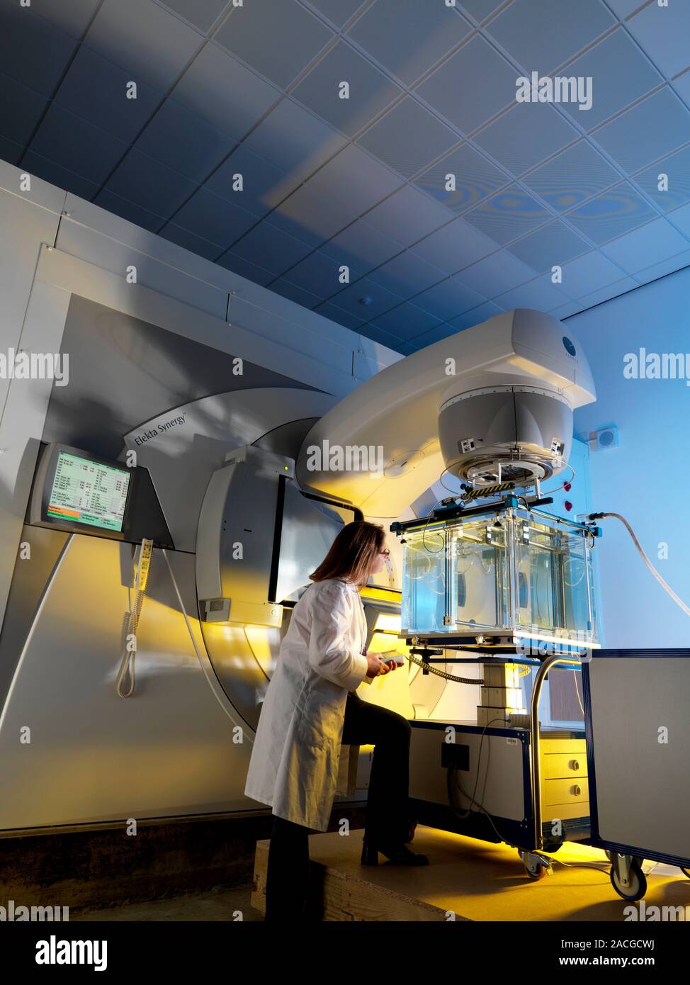 Medical radiotherapy linear accelerator being tested by a medical ...