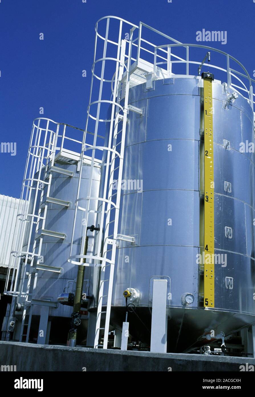 Oil refinery. Storage tanks containing petroleum products at a ...
