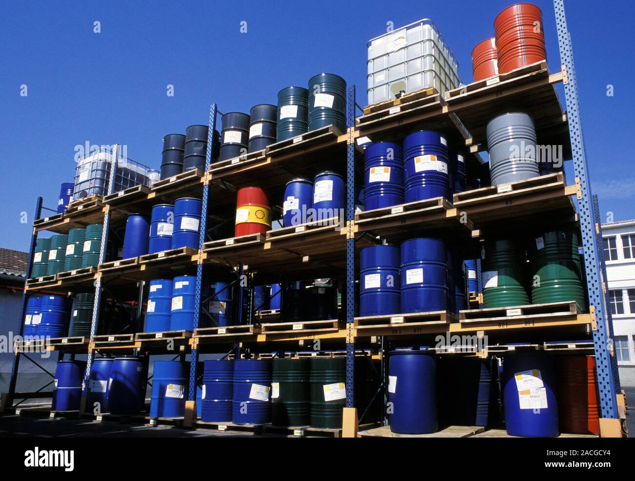 Chemical storage. Chemicals being stored in metal drums Stock Photo - Alamy