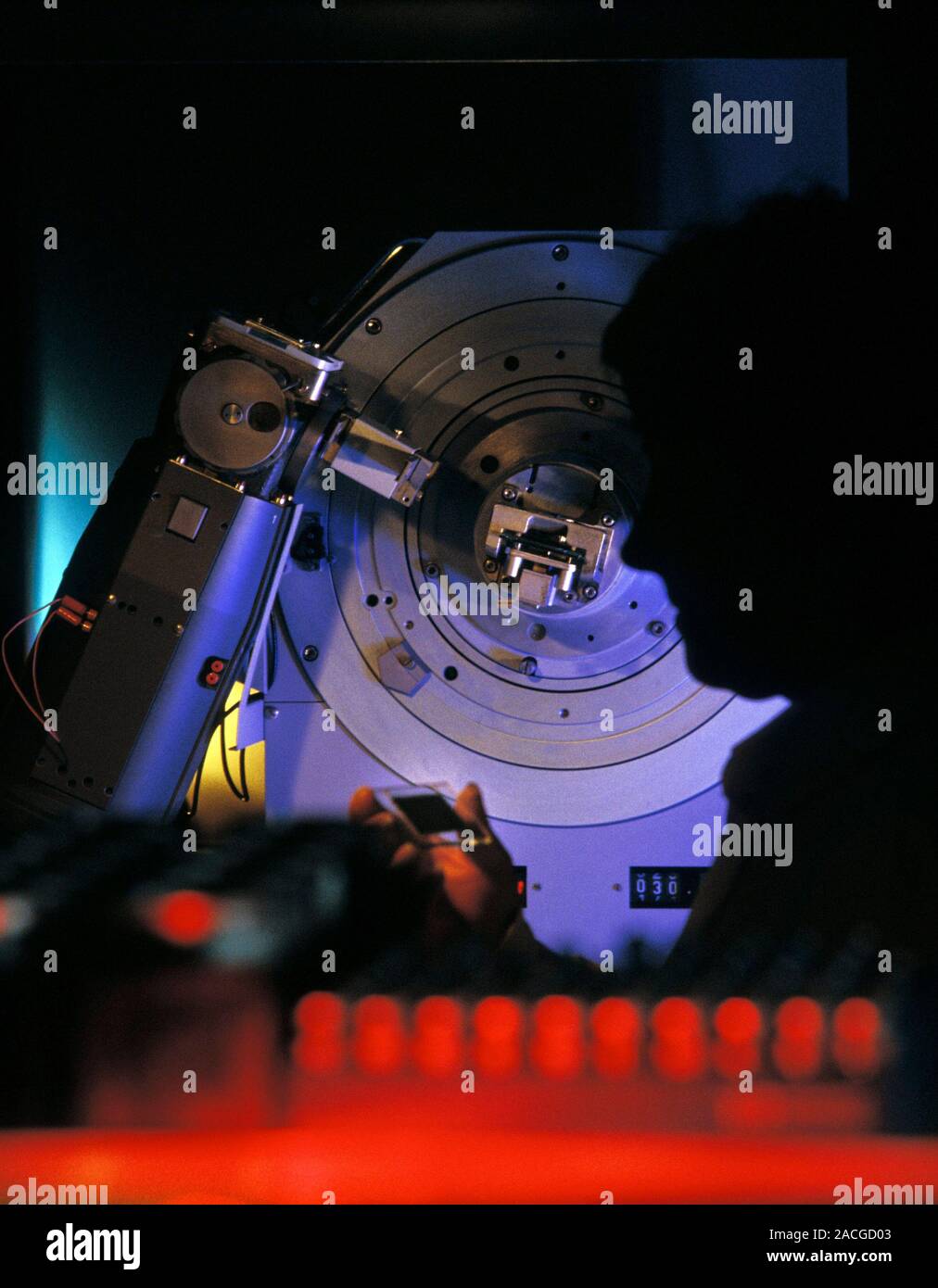 Chemical analysis. Scientist analysing chemical samples using X-ray ...