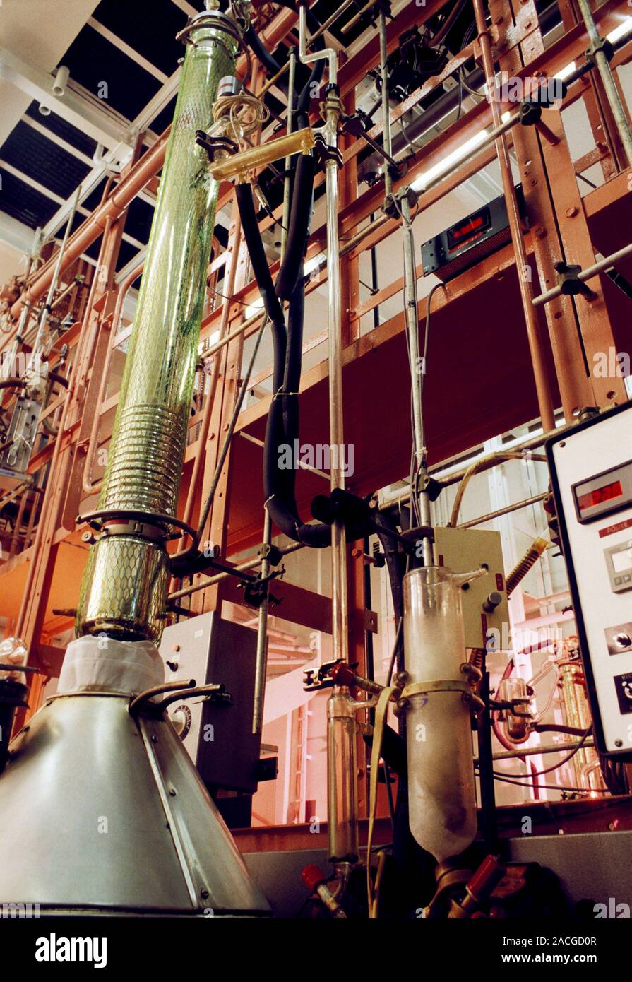 Oil refinery. Distillation column at a petroleum plant Stock Photo - Alamy