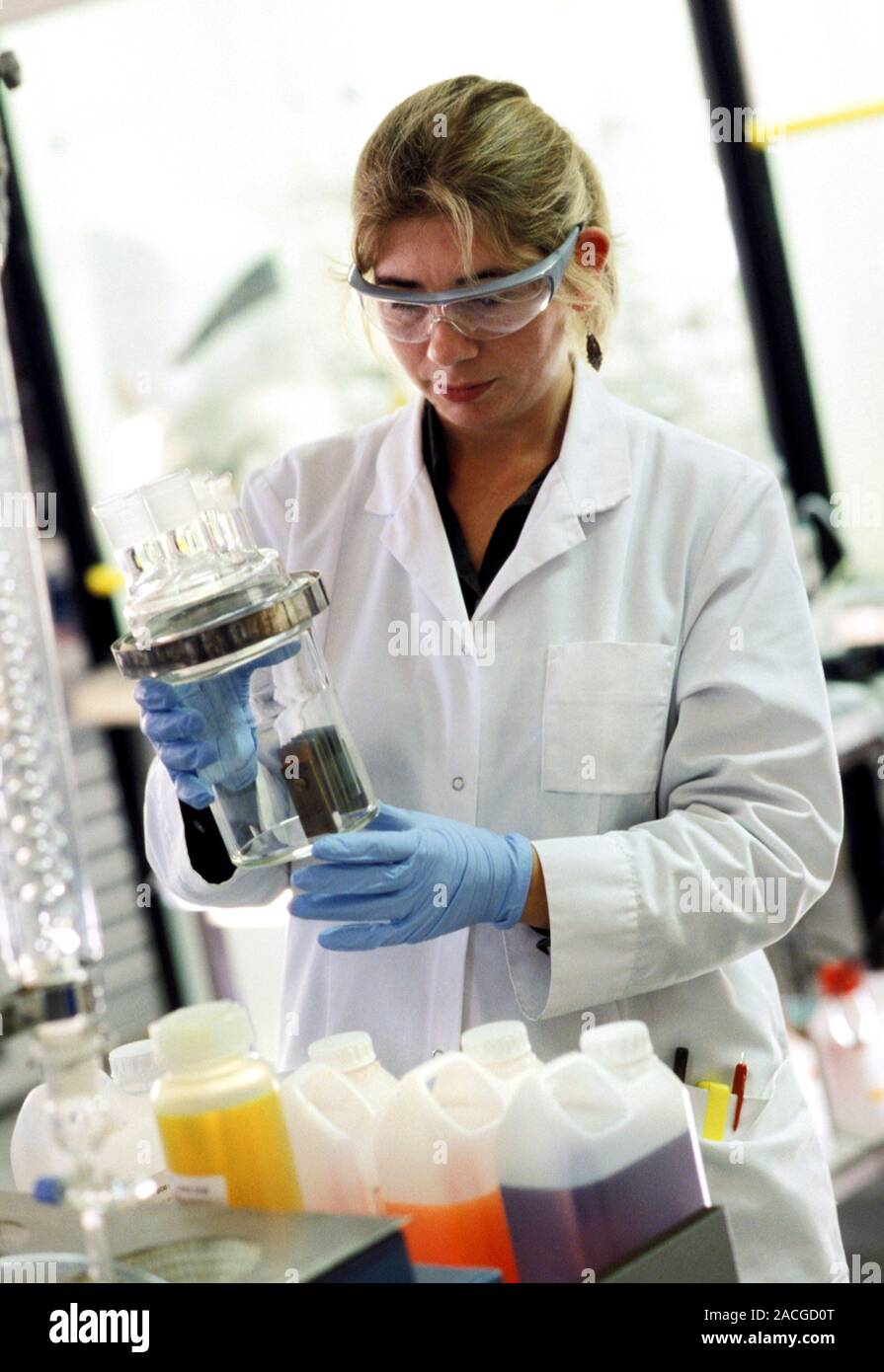 Chemical testing. Scientist testing the oxidation of metals at a ...