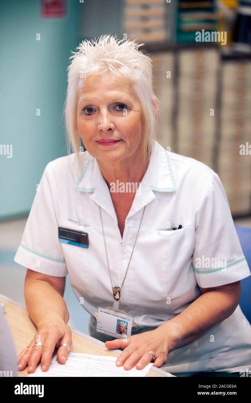 Hospital staff. Rehabilitation assistant on a hospital ward Stock Photo ...