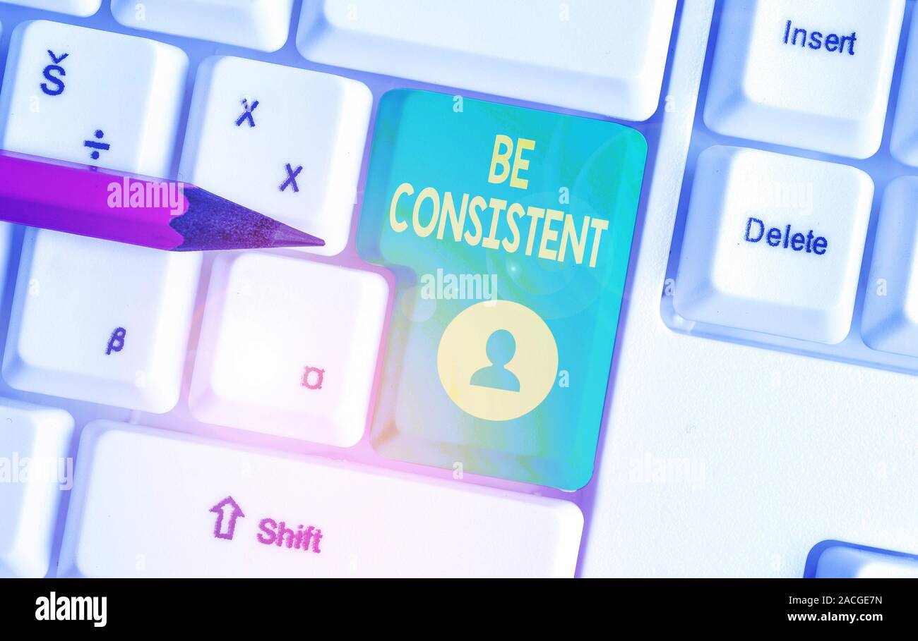 Writing note showing Be Consistent. Business concept for Uniform ...