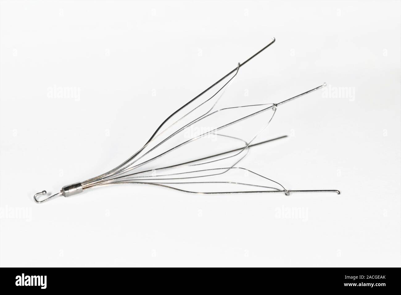 Inferior vena cava filter. This device is placed in the vena cava vein ...