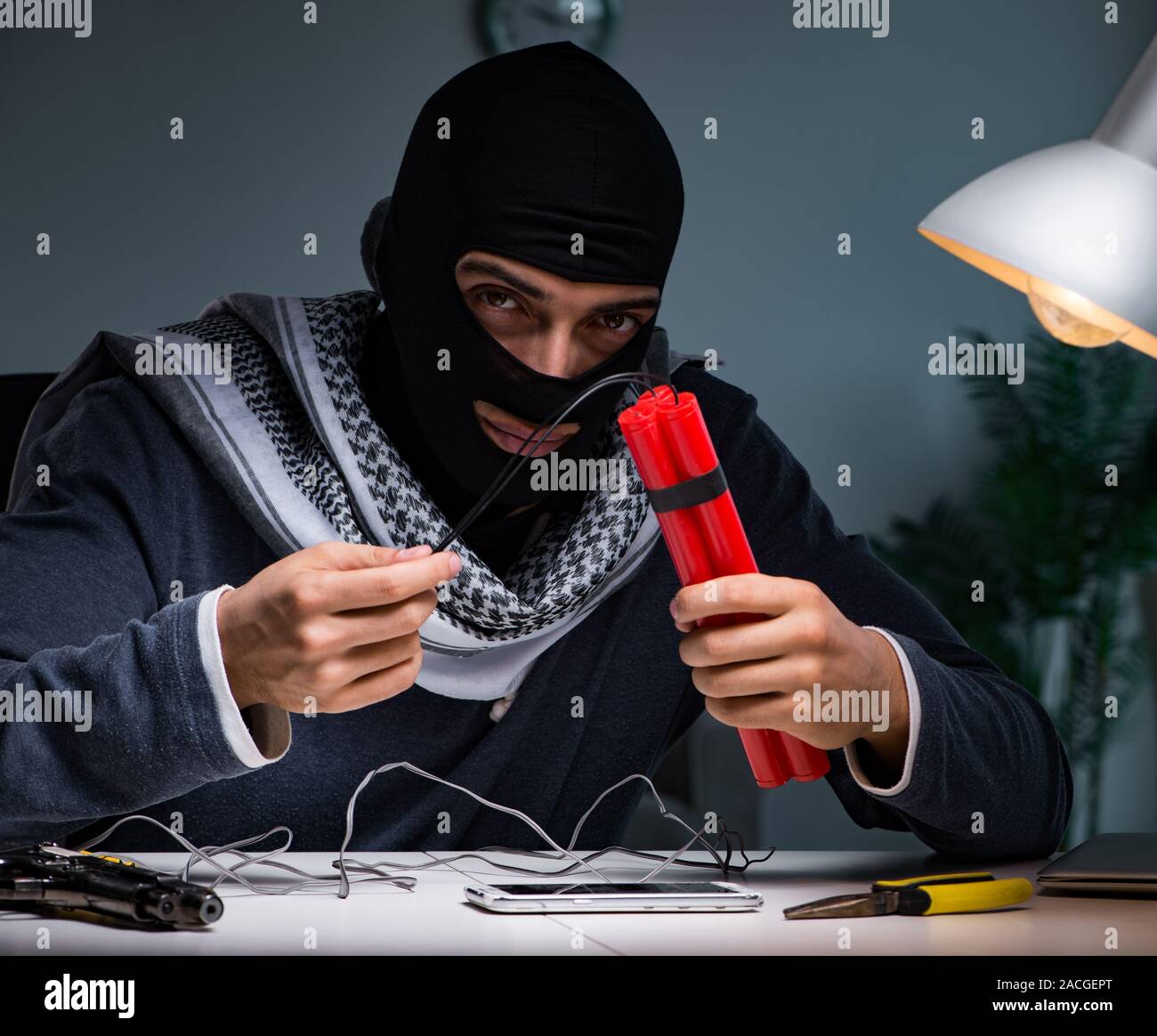 The terrorist bomber preparing dynamite bomb Stock Photo - Alamy