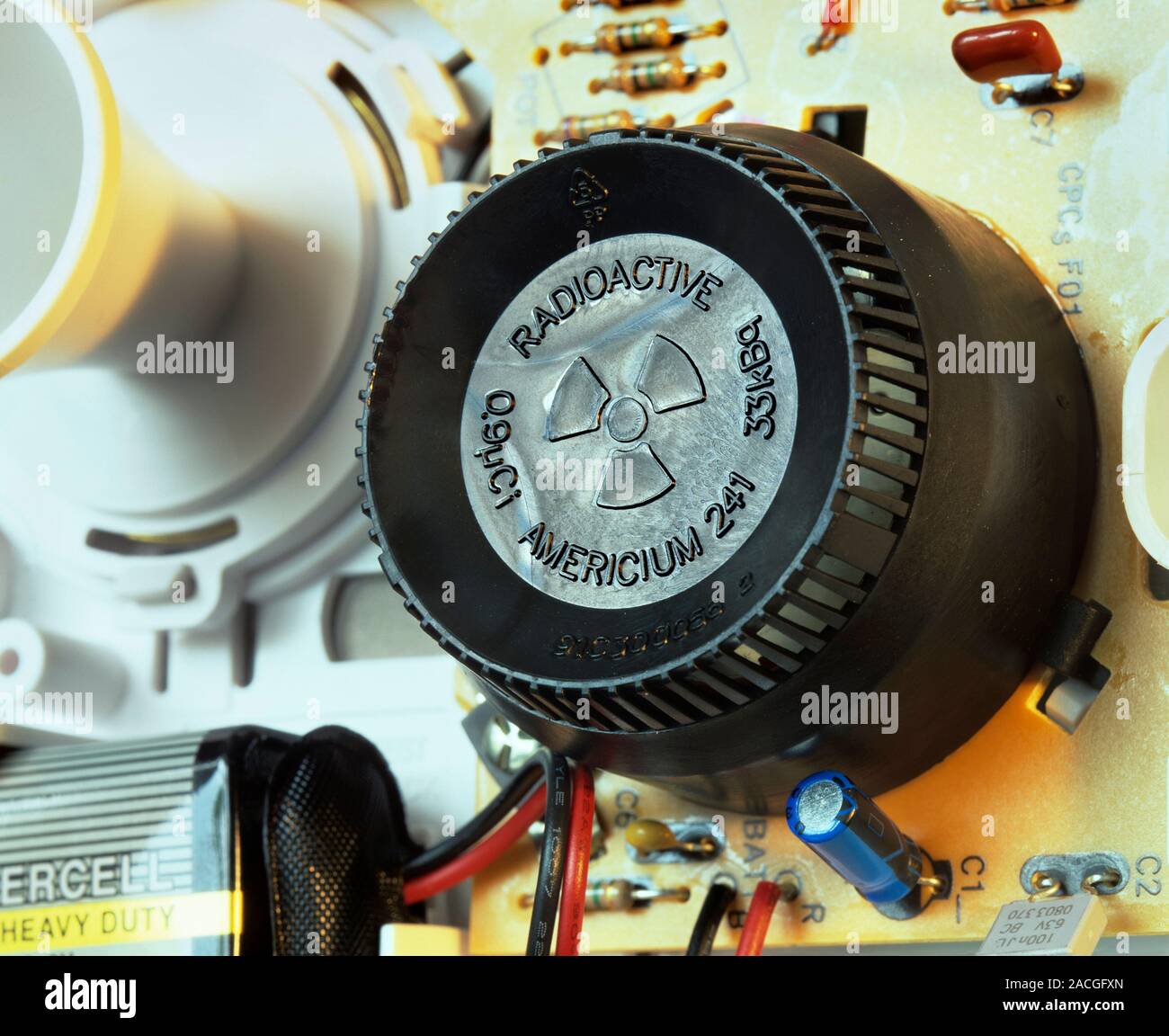 Smoke detector radiation source. Close-up of the internal componenets ...