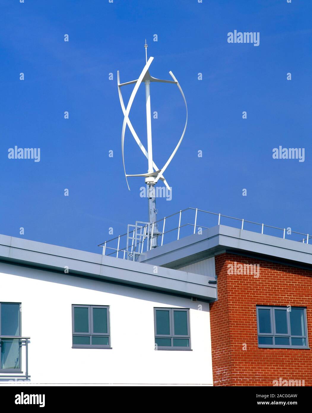 Domestic micro wind turbine. Vertical axis micro wind turbine on top of ...