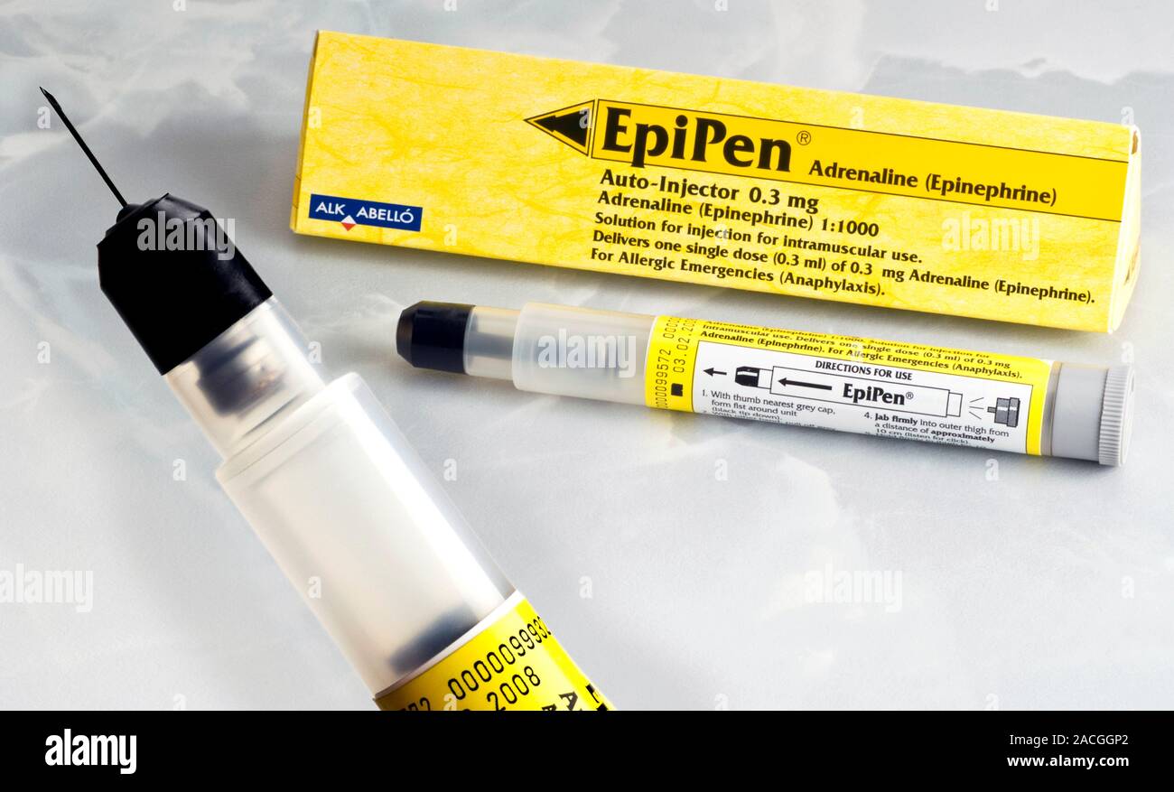 EpiPen adrenaline syringe and packaging. This device is used for the ...