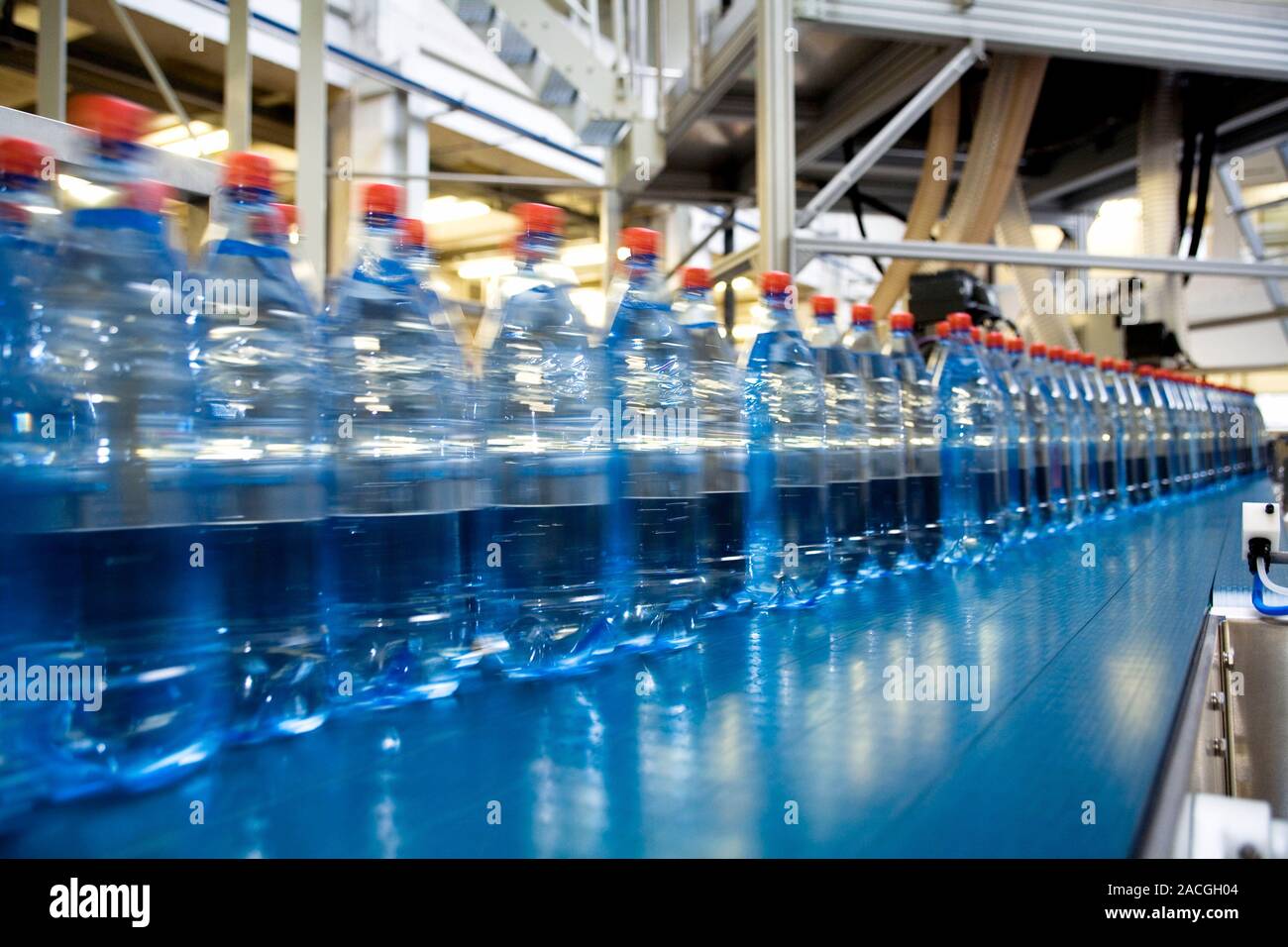 Bottled water production line. This is the bottling plant of the ...