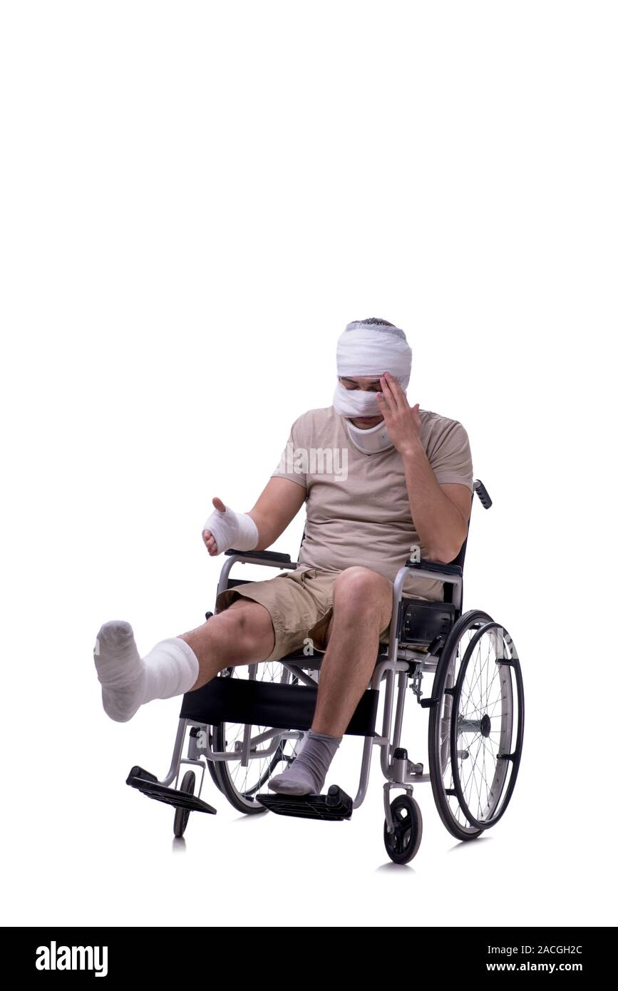 The injured man in wheel-chair isolated on white Stock Photo - Alamy