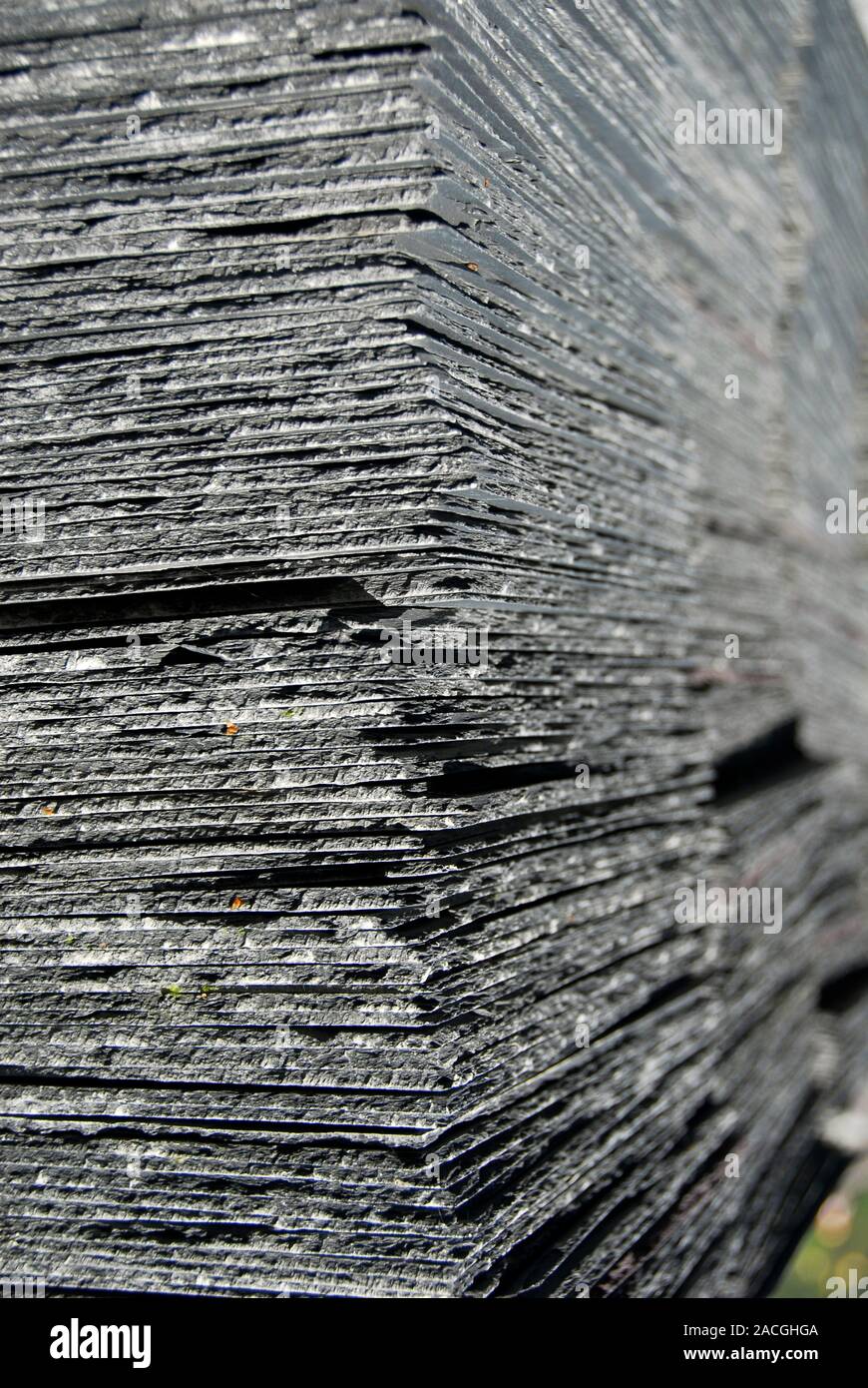 Welsh slate. Close-up of a stack of cut slate. Photographed in Wales ...