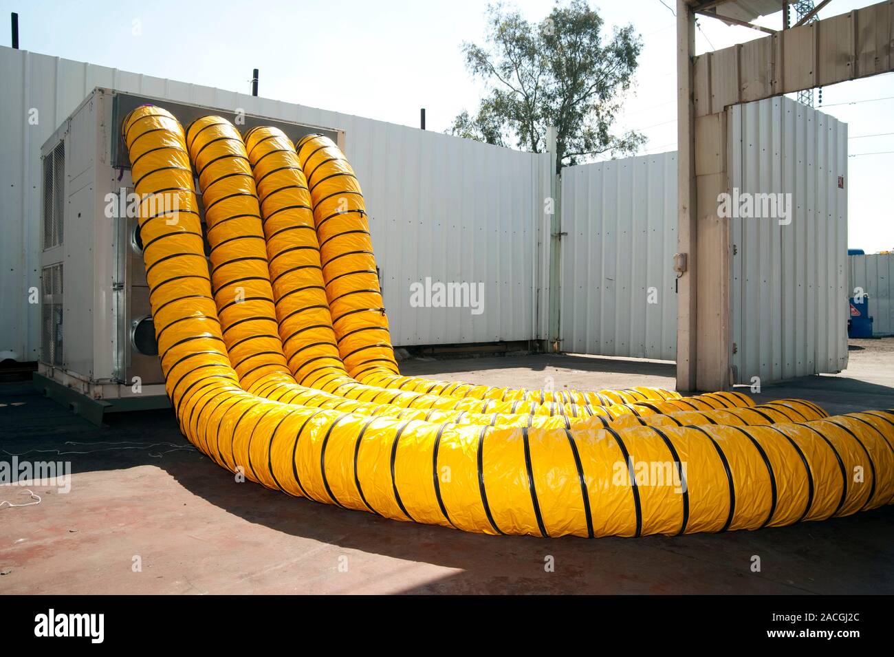 Air compressor tubes. These tubes (yellow) are part of an air ...