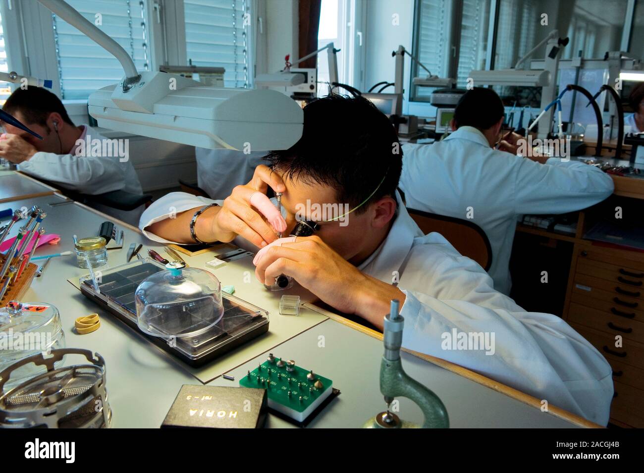 Watchmaking. Watchmakers at the Jaeger-LeCoultre factory. Jaeger ...