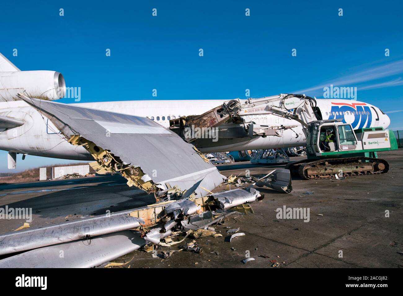 Aircraft dismantling. Passenger plane being disassembled. At the end of ...