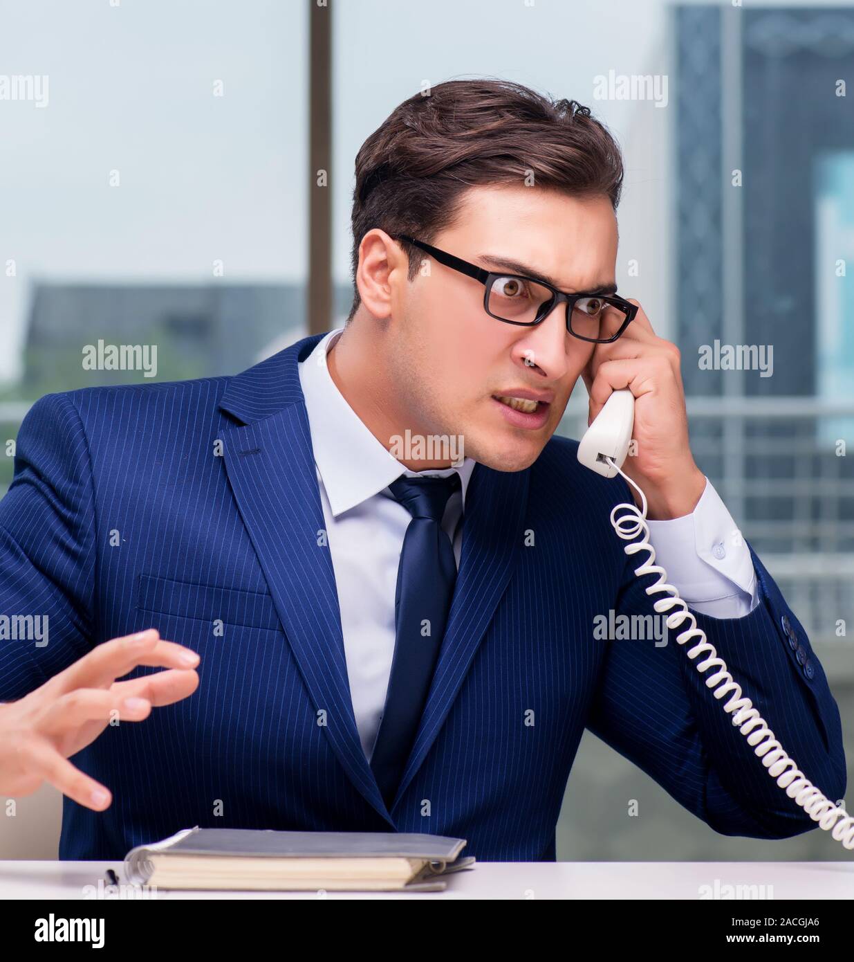 The angry call center employee yelling at customer Stock Photo - Alamy