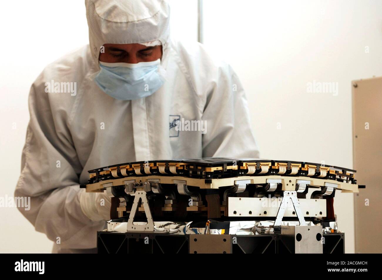 Kepler Mission focal plane assembly. Engineer working on the assembly ...
