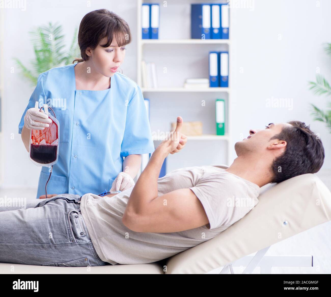 Patient getting blood transfusion in hospital clinic Stock Photo - Alamy