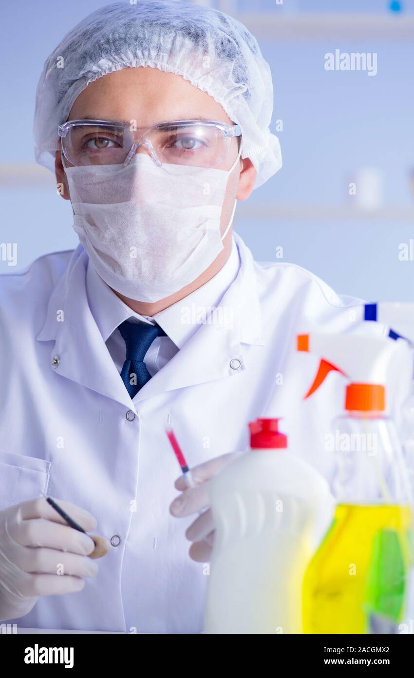 The man in the lab testing new cleaning solution detergent Stock Photo ...