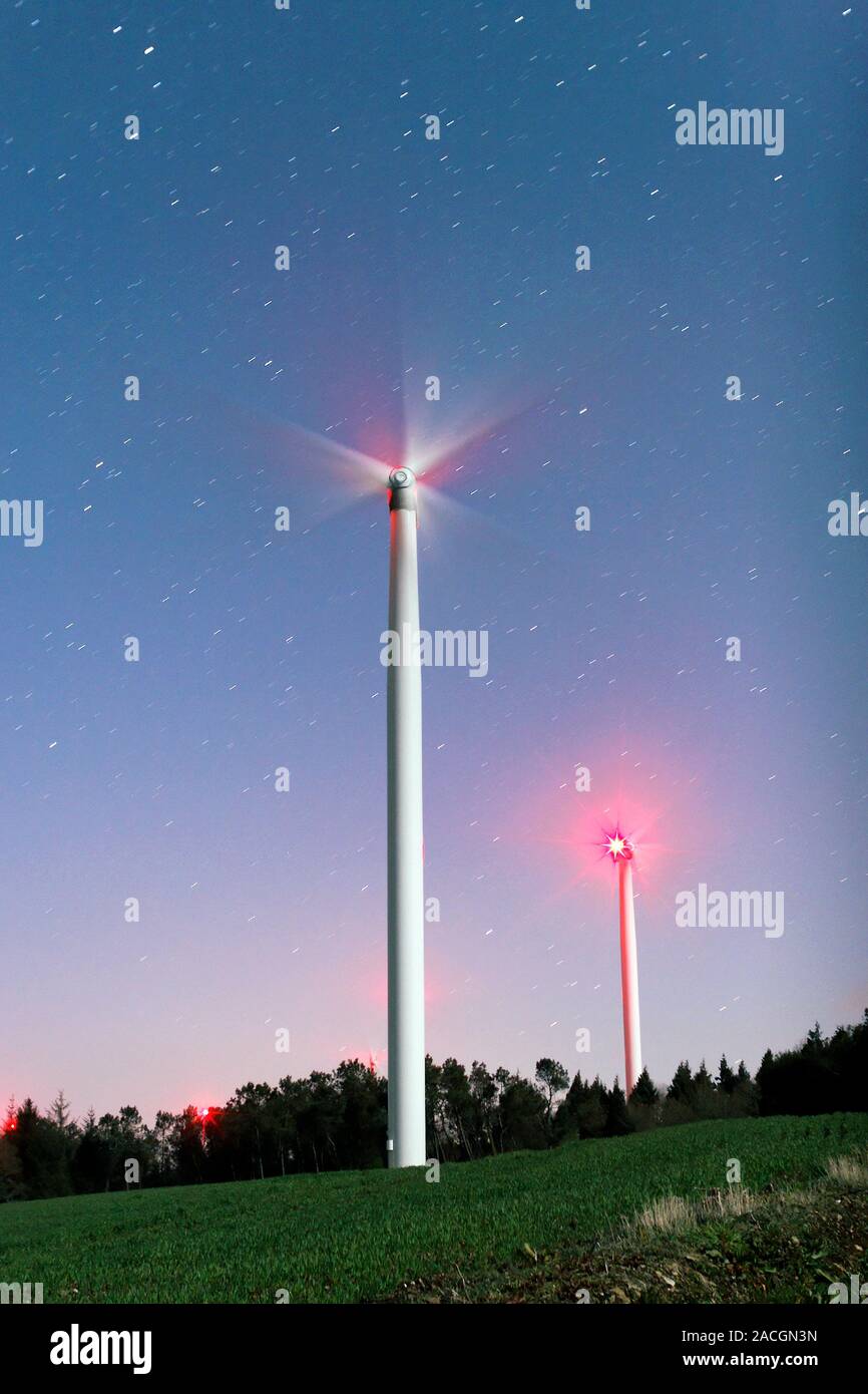 Wind turbines under stars Stock Photo - Alamy