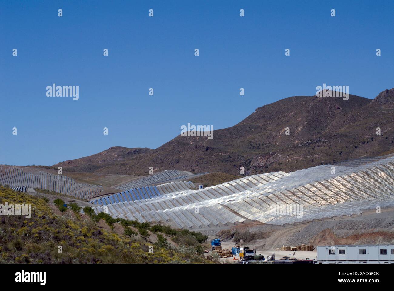 Solar power plant. Array of solar cells at a solar power plant in Cala ...