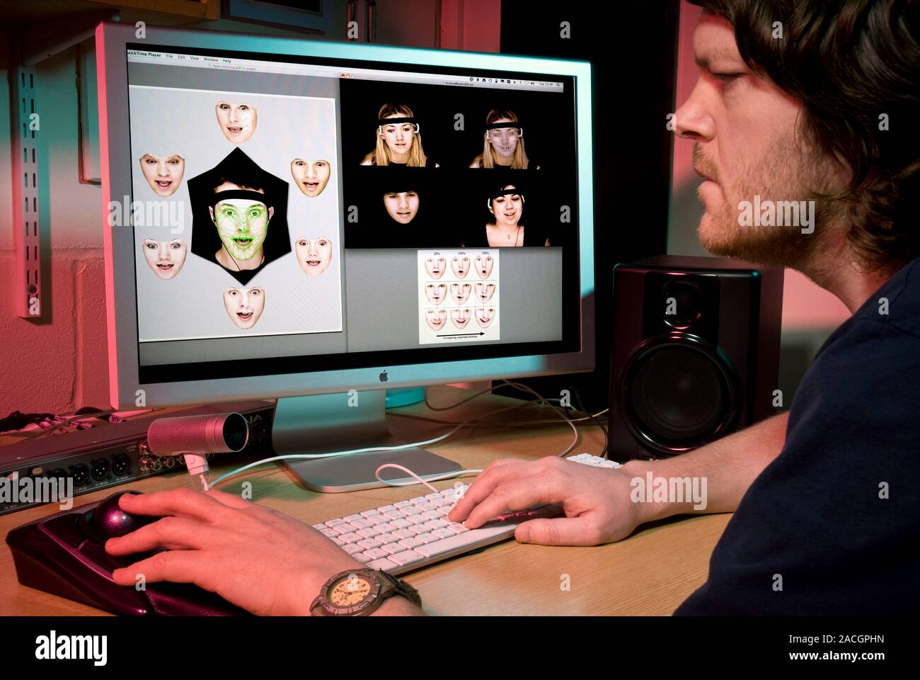 Facial expression cloning software. Researcher using software that ...
