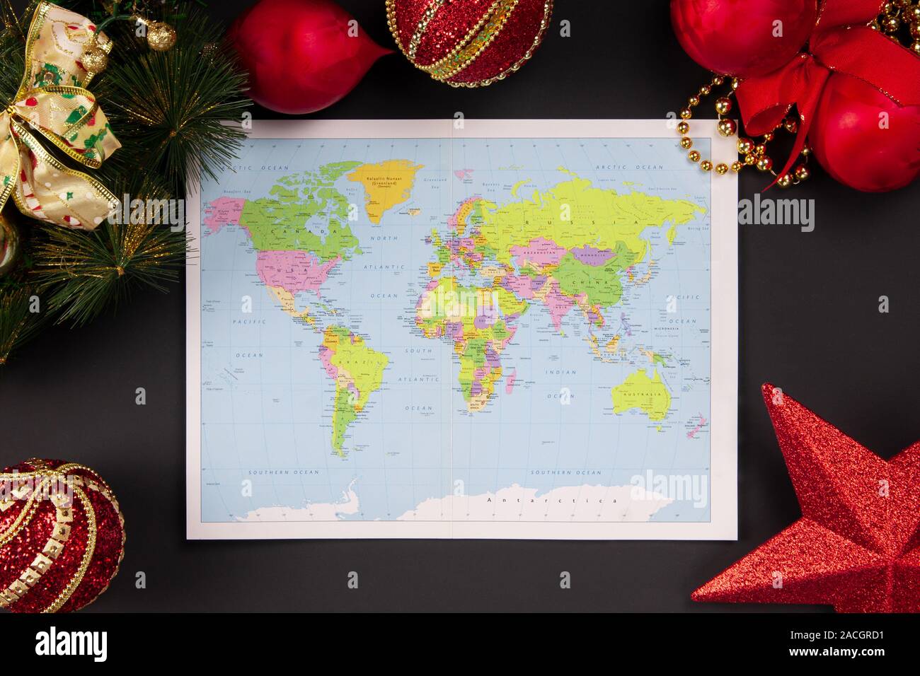 World map on christmas background top view Stock Photo - Alamy