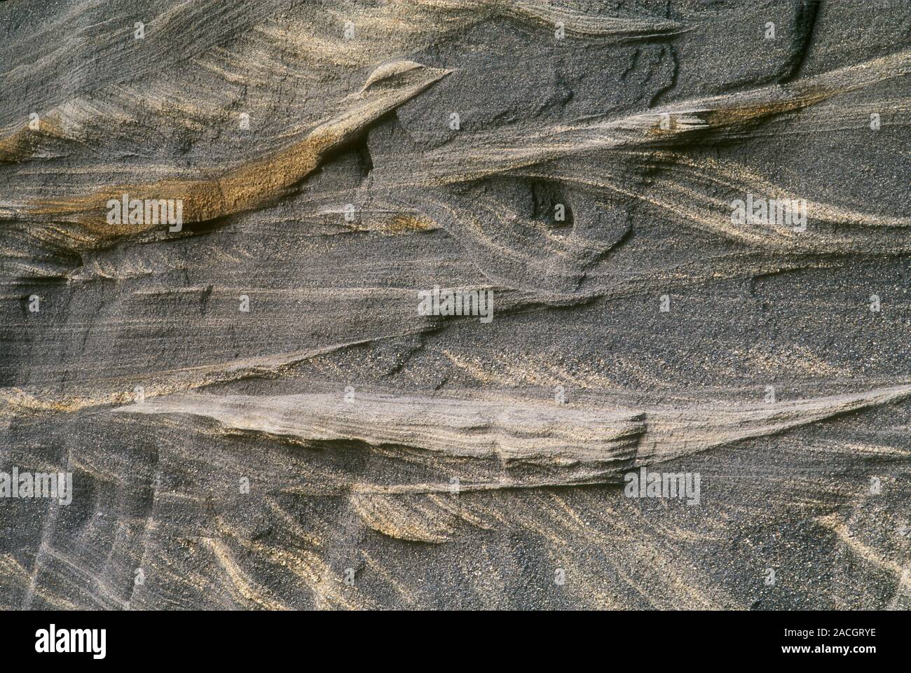 Volcanic ash layers in rock. Cross-bedded layers of volcanic ash laid ...