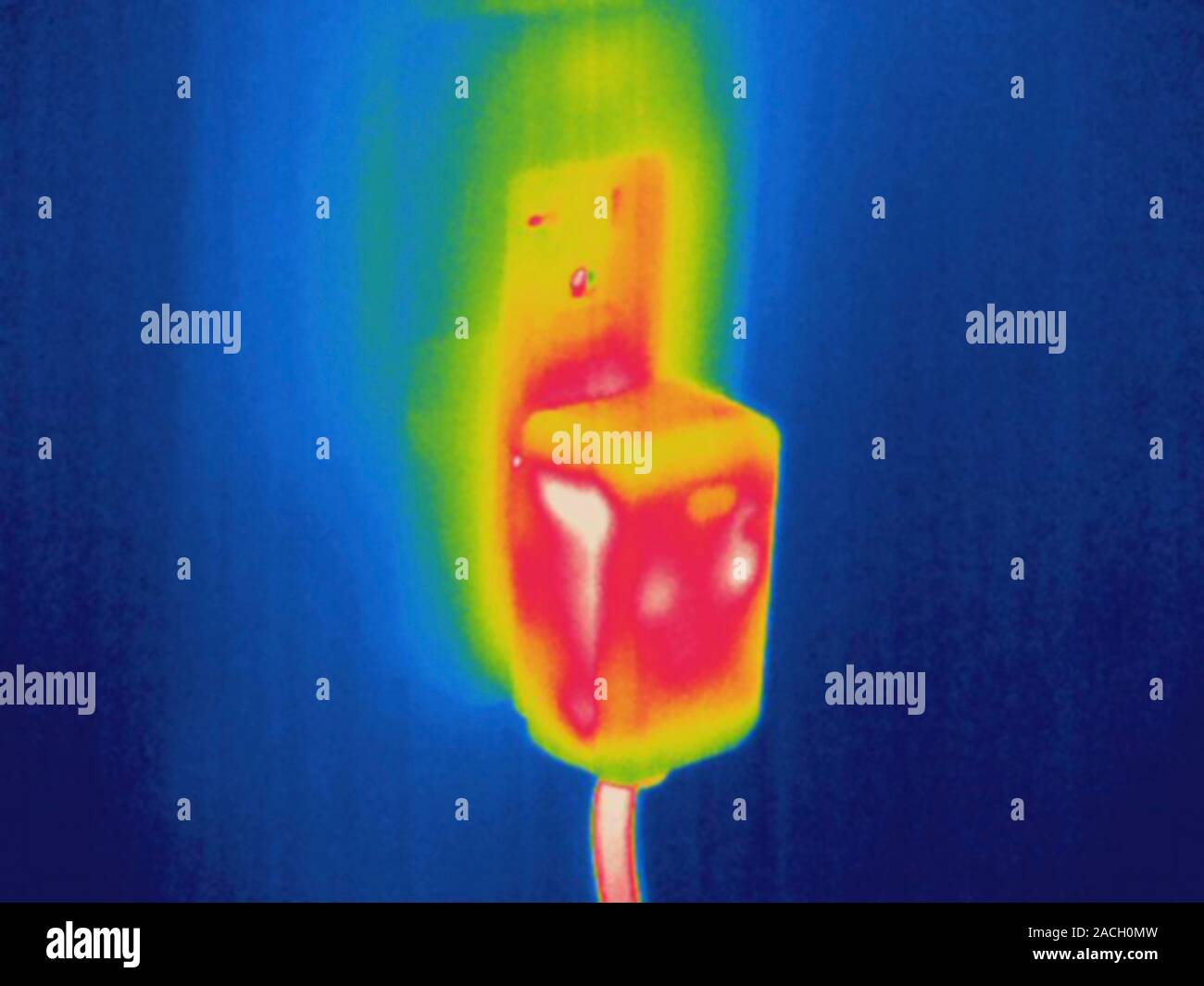 Thermogram of an electrical outlet in use. The colors show temperature ...