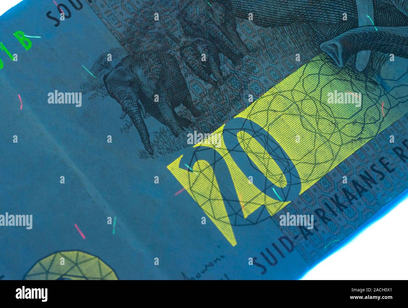 South African banknote in UV light. Close up of a 20 Rand banknote ...