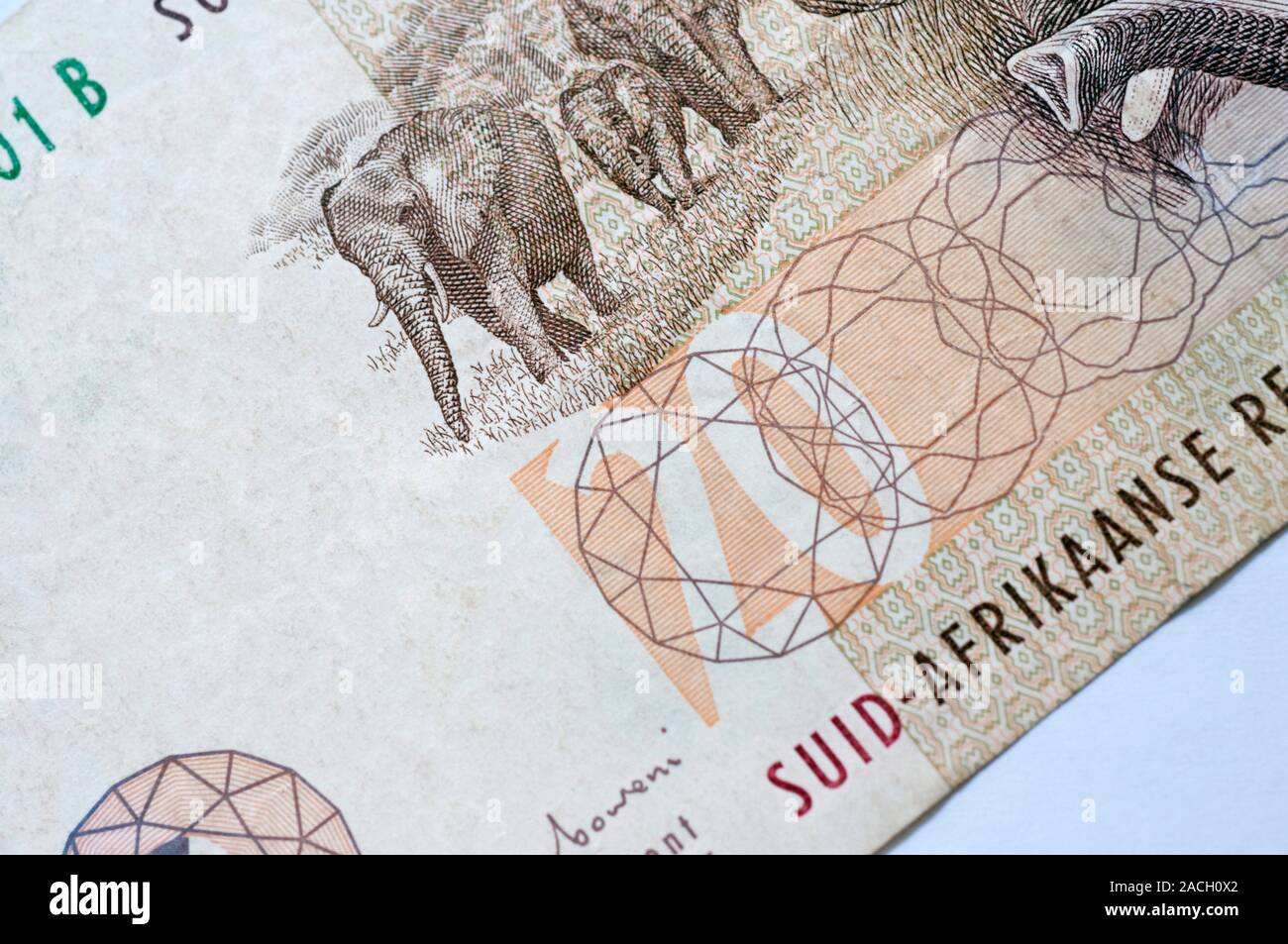 South African banknote in UV light. Close up of a 20 Rand banknote ...