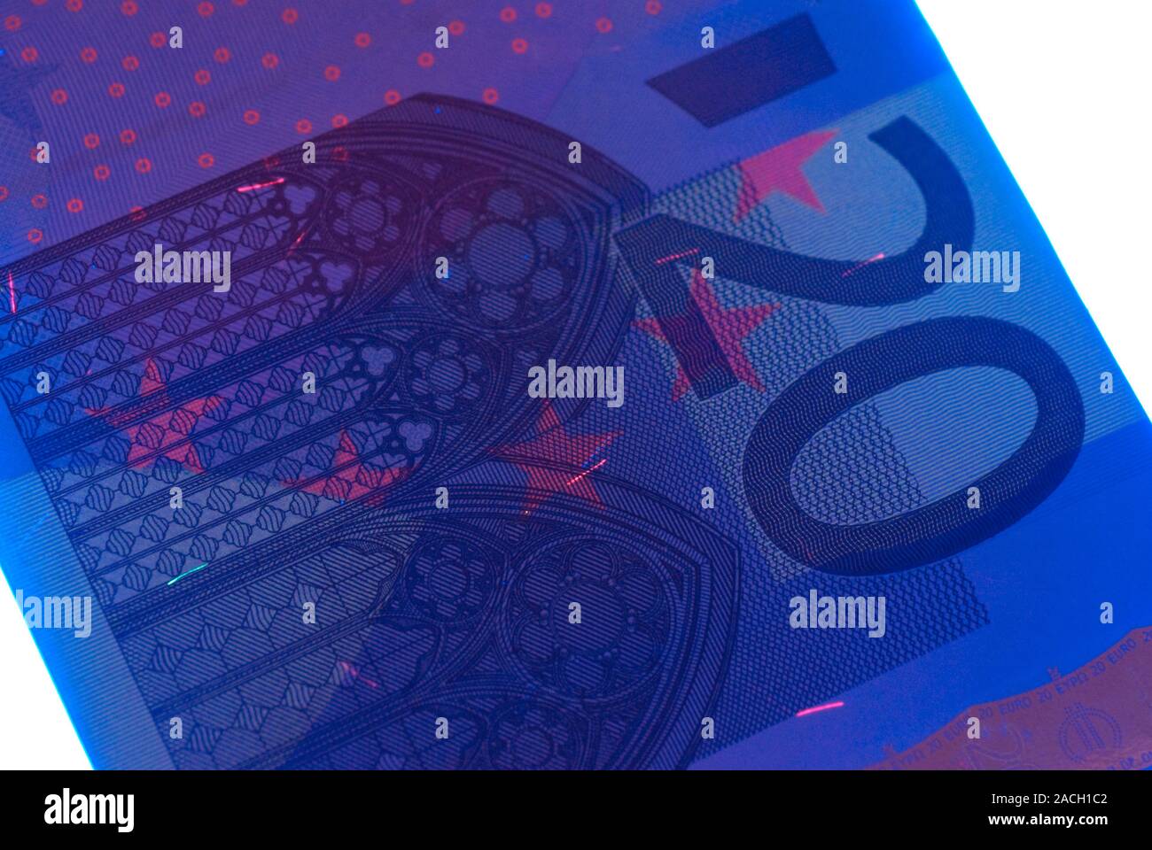 Euro banknote in UV light, close up. The design on this 20 Euro ...