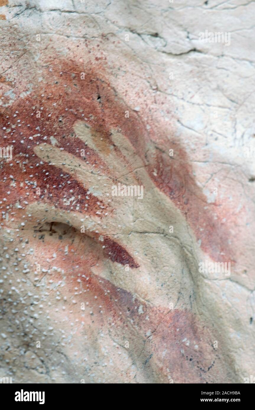 Rock painting, Timor-Leste. Prehistoric rock art of a hand stencilled ...