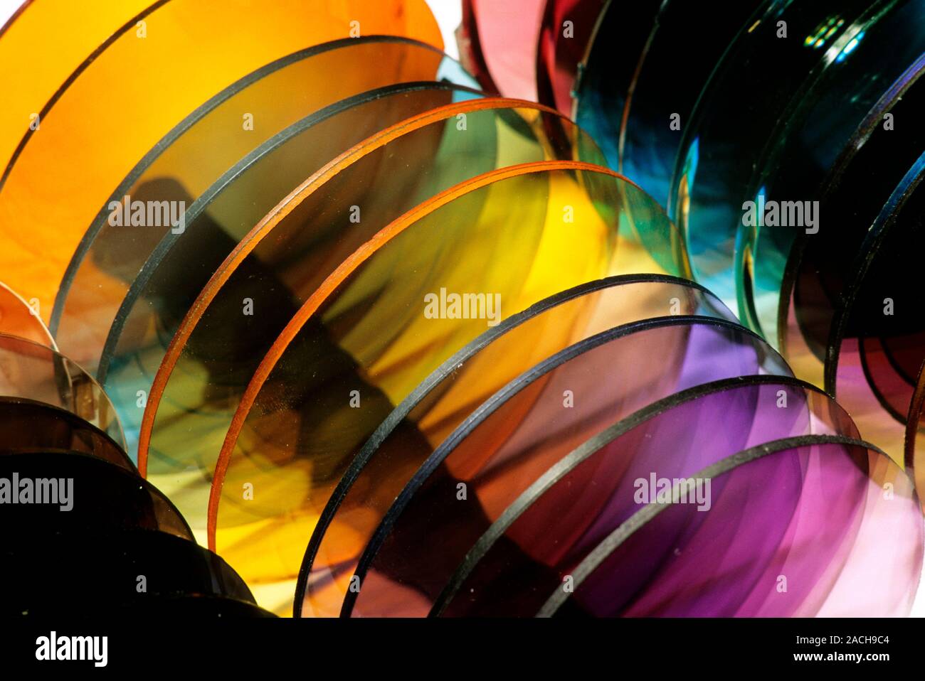 Eyeglasses manufacturing. Rows of plastic lens blanks that have ...