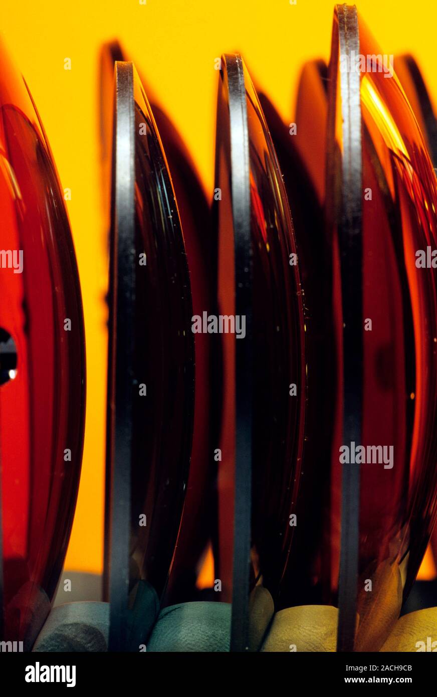 Eyeglasses manufacturing. Row of plastic lens blanks that have ...