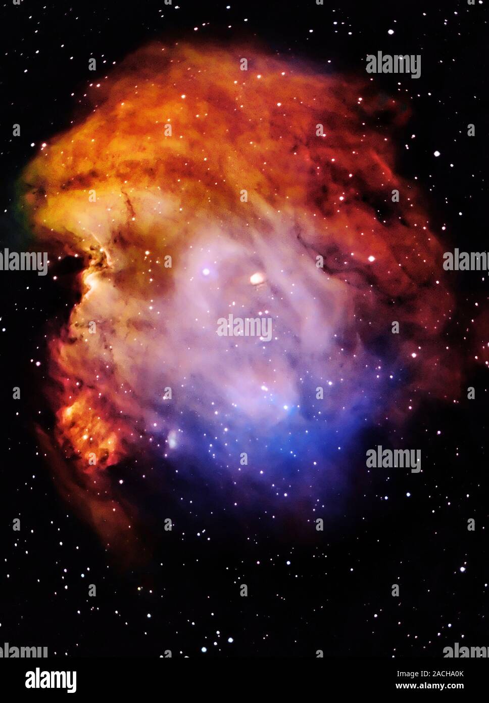 Open cluster NGC 2175. The cluster is surrounded by the emission nebula NGC 2174, a huge cloud ...