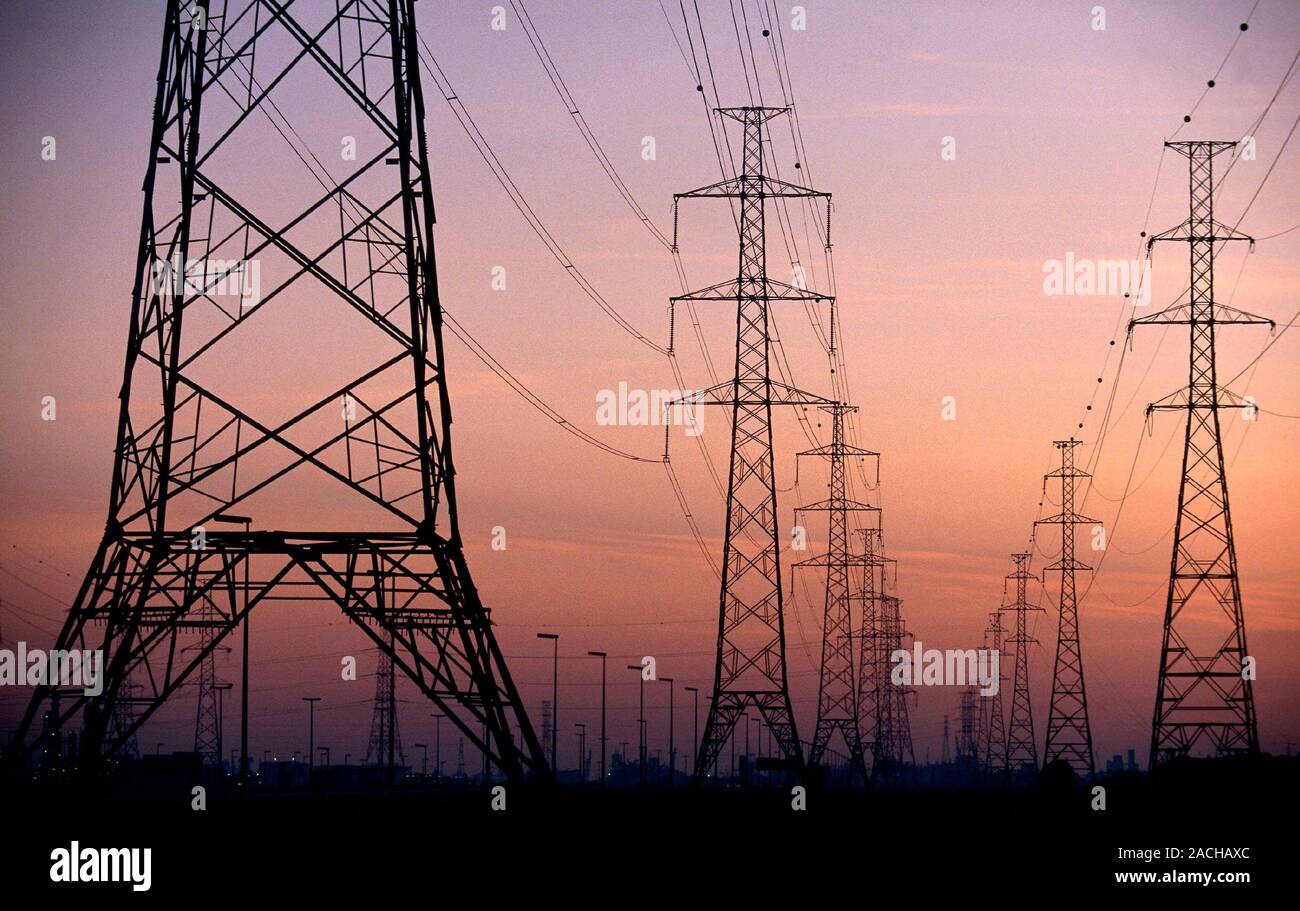 Electricity pylons carrying high voltage power cables Stock Photo - Alamy